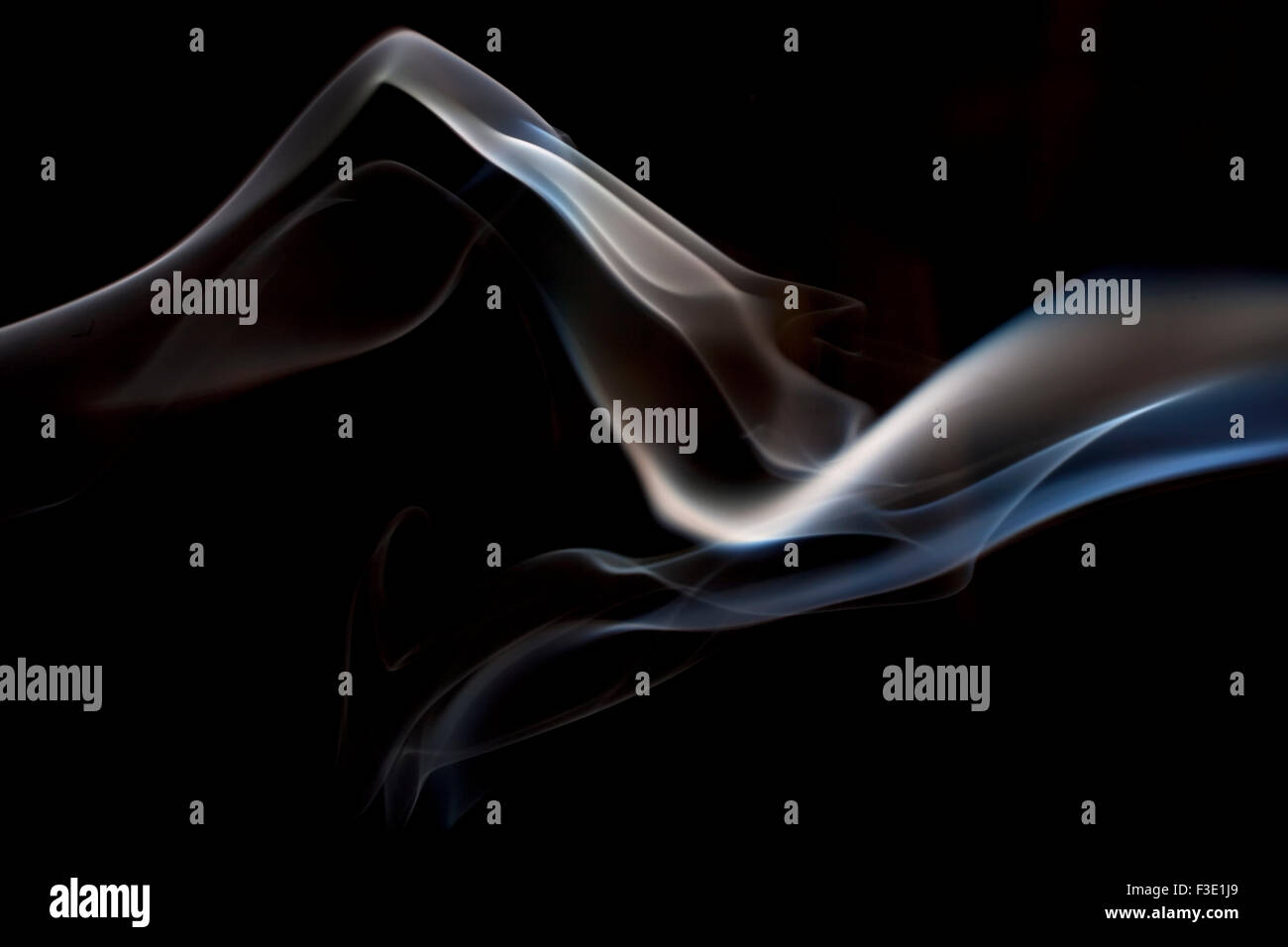 Smoke over the black background Stock Photo - Alamy