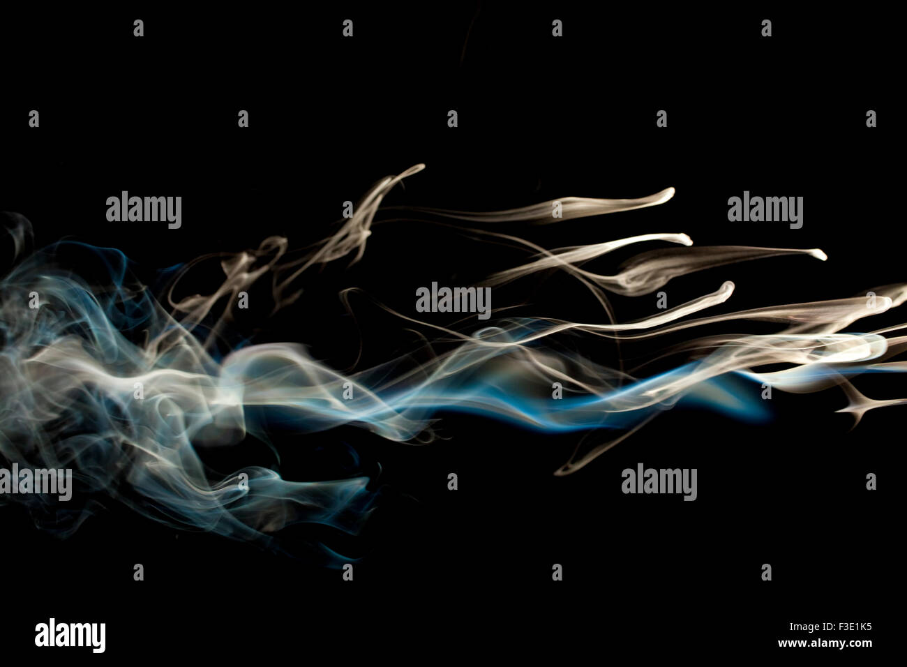Smoke over the black background Stock Photo - Alamy