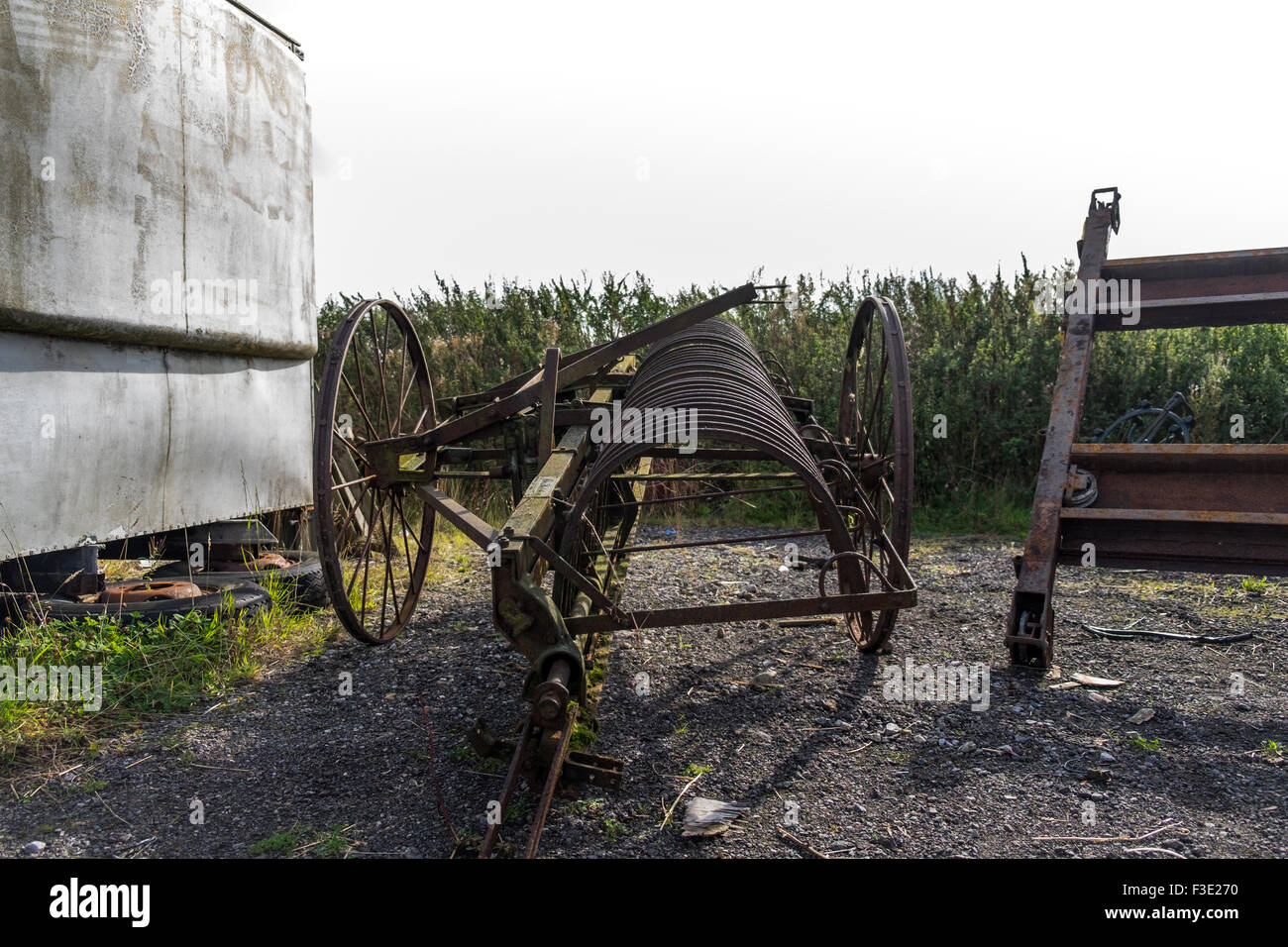 Old and broken rusty machine for separating hay in the fields Stock ...