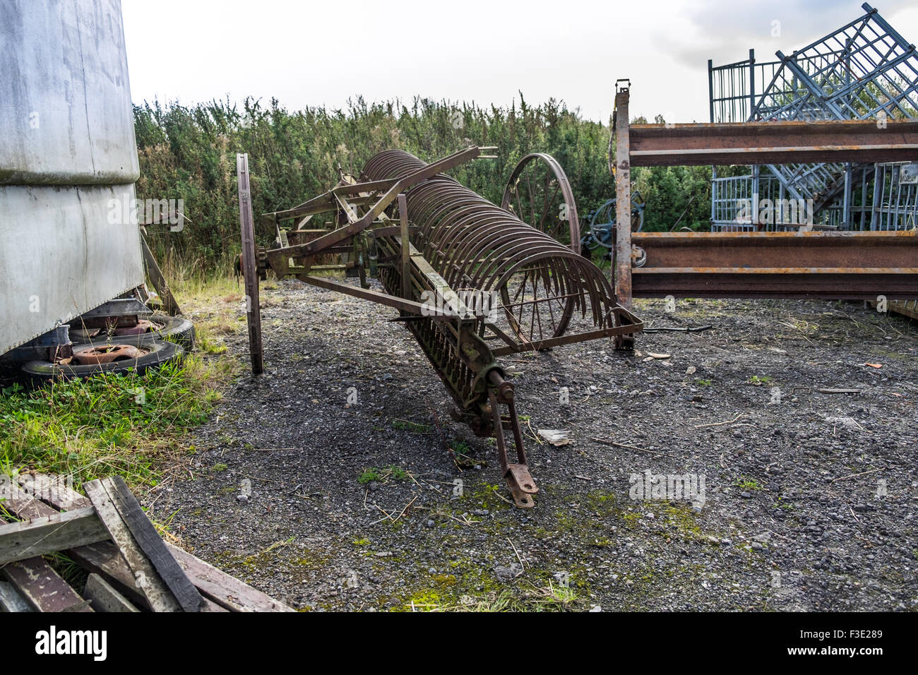 Old and broken rusty machine for separating hay in the fields Stock ...
