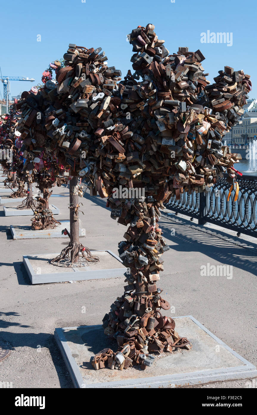 Trees with locks of lovers on trees at Bolotnaya waterfront Stock Photo ...