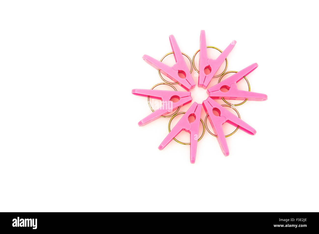 pink clothespins line up as a circle on a white background Stock Photo ...