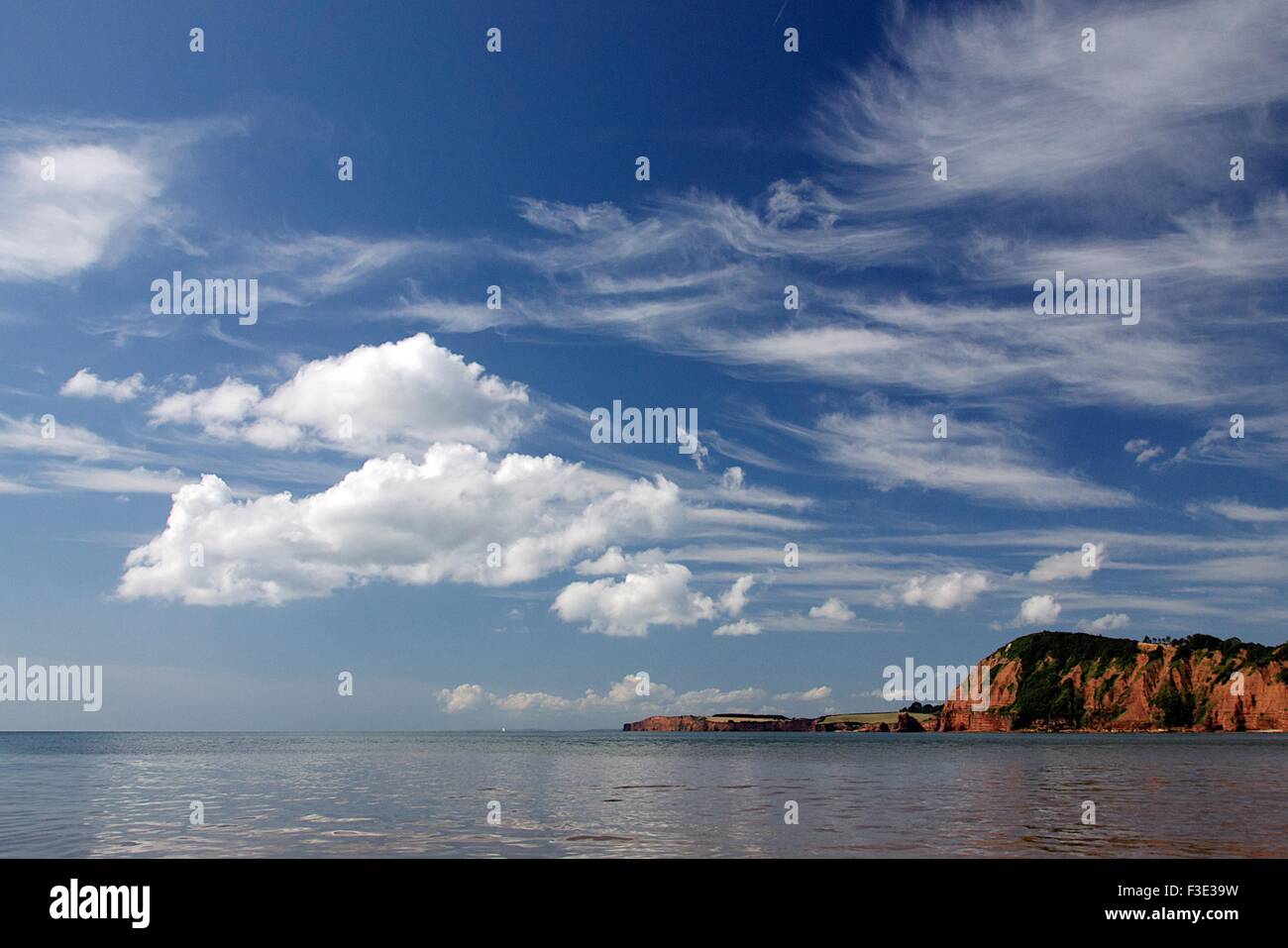 Devonshire coast at Sidmouth, Devon with red cliffs, beach and the sea ...