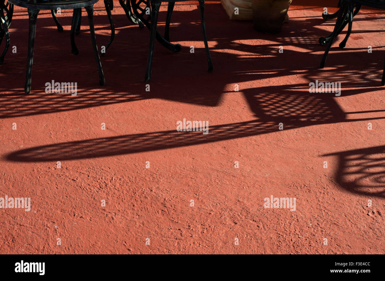 Iron chairs tables ahadow hi-res stock photography and images - Alamy