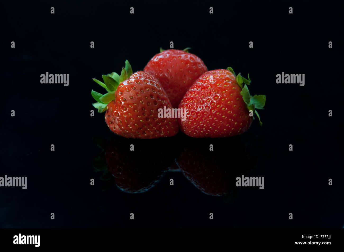 Three strawberrys hi-res stock photography and images - Alamy