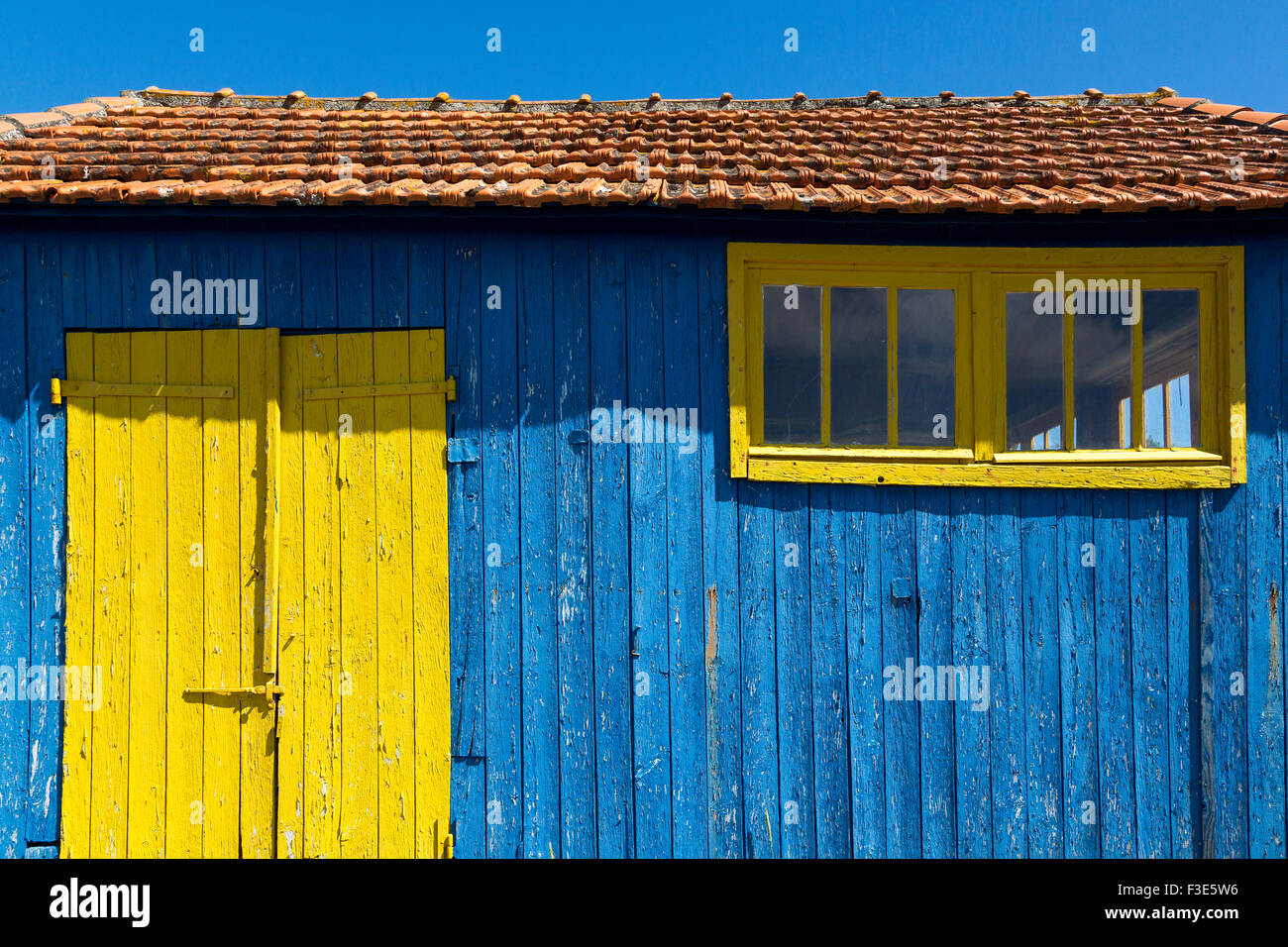 Colourful cabins oyster farmers harbour Le Chateau d'Oleron island d ...