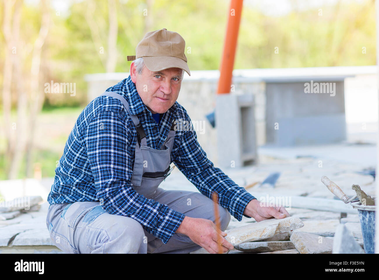 Senior man working Stock Photo - Alamy