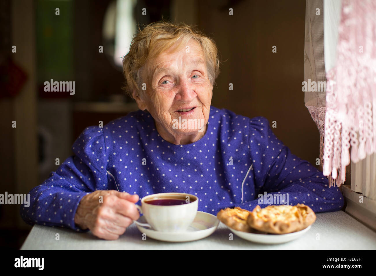 Old age pensioner drinking tea hi-res stock photography and images - Alamy