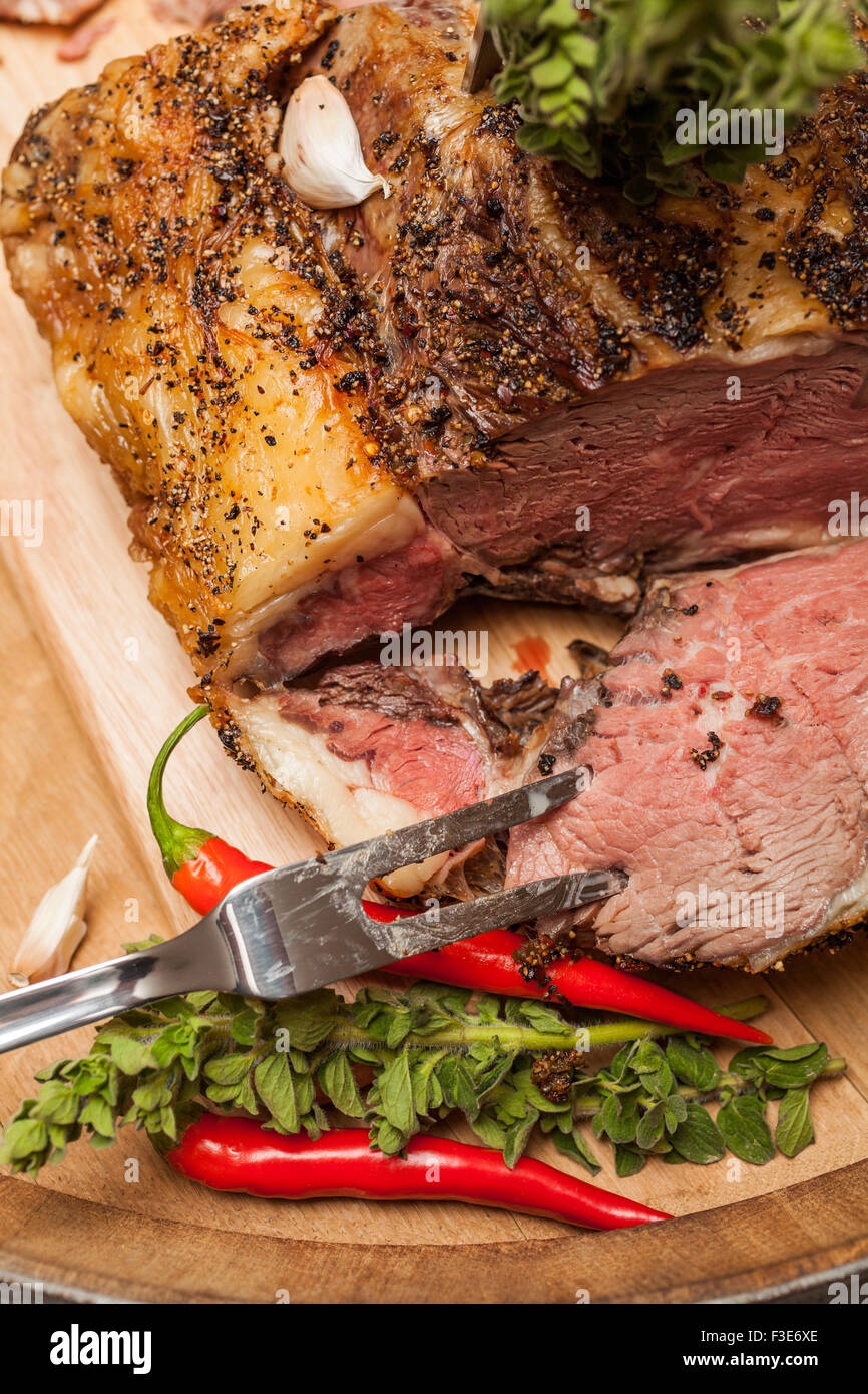 Medium Rare Cooked Beef Roast with Vegetables and Spices Stock Photo ...