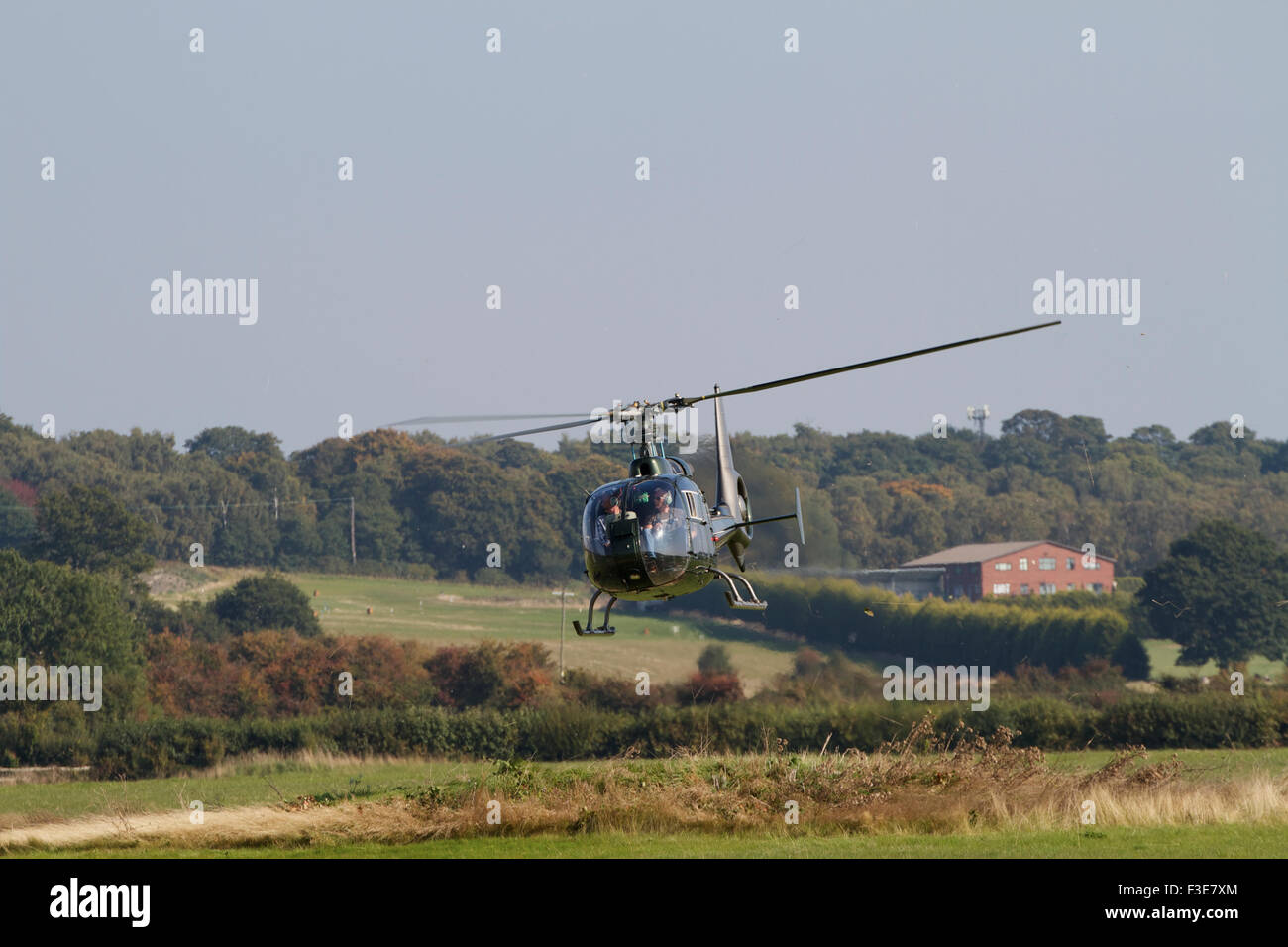 Helicopter manouvering over grass at Wolverhampton Airport. UK Stock ...