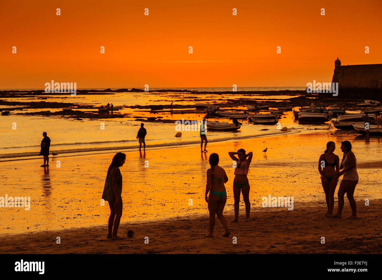 La Caleta beach boats sunset Cadiz Andalusia Spain Stock Photo - Alamy