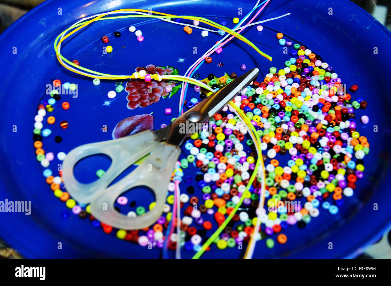 Accessory beads and tools for made ornament at shop Stock Photo - Alamy