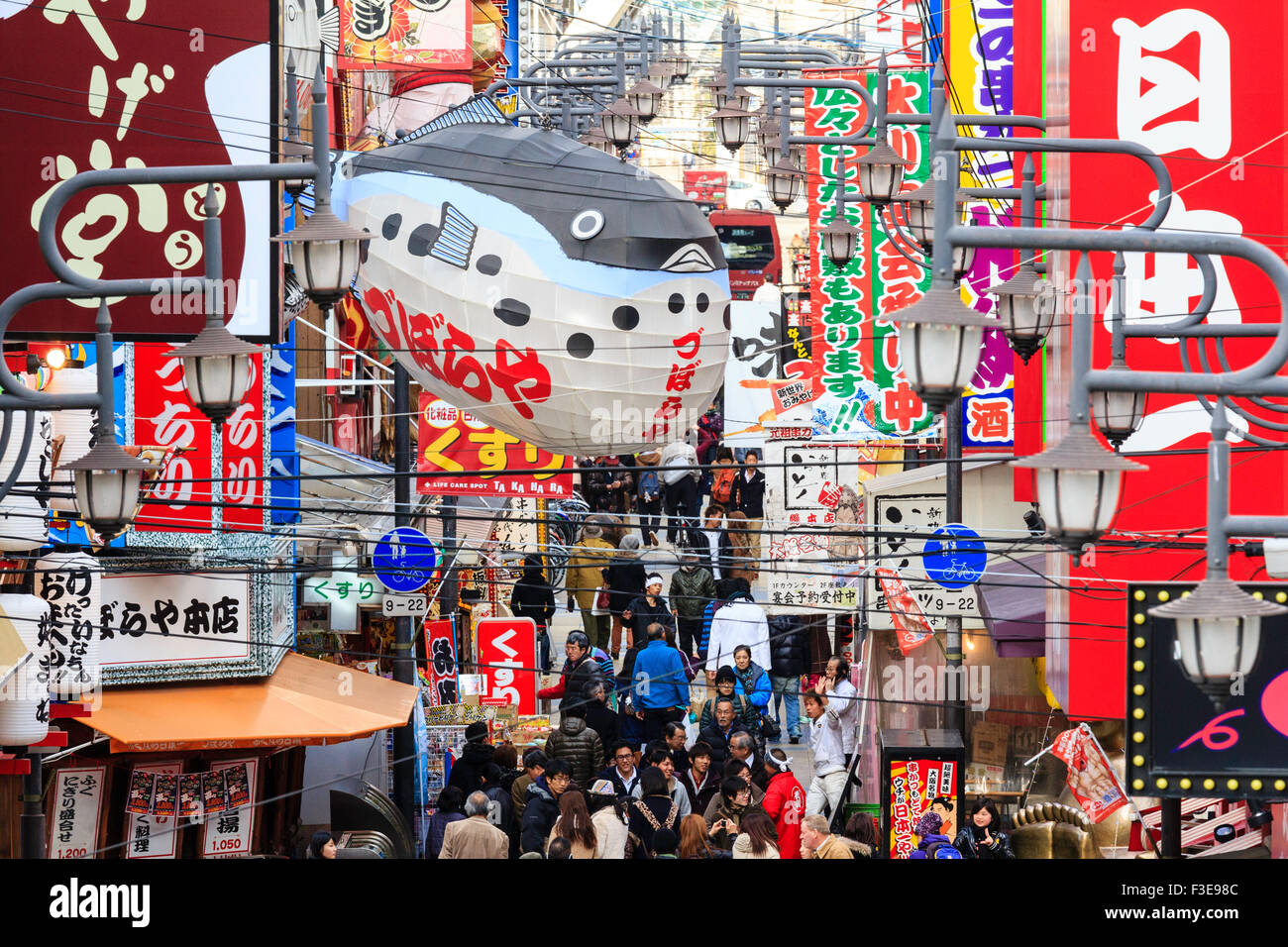 Shinsakei, in downtown Osaka. Famous Puffer fish sign hanging outside ...