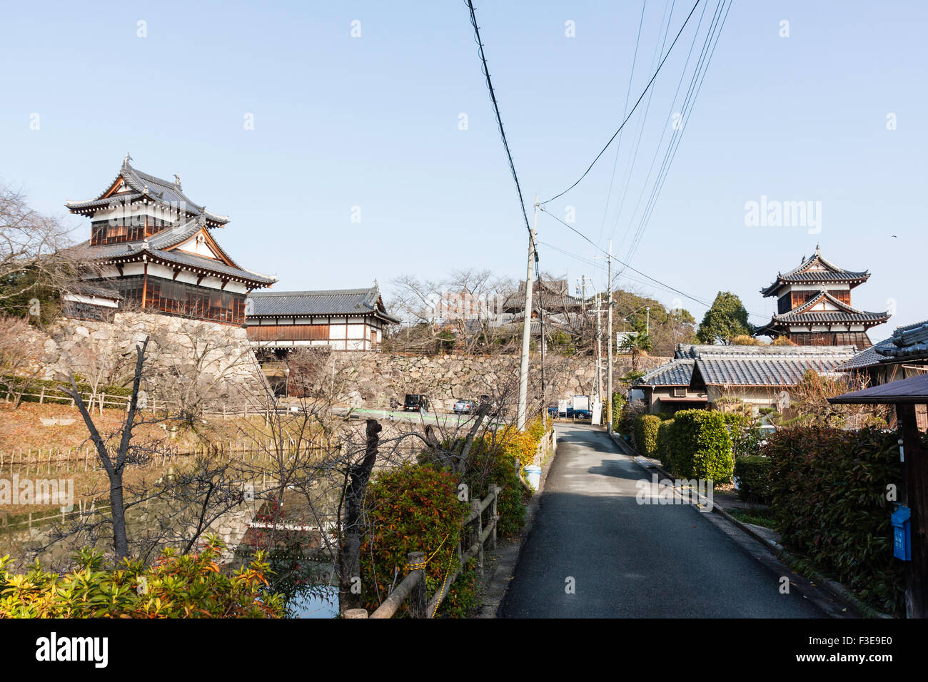 Japan, Yamato Koriyama Japanese castle. Approach road and moat leading ...