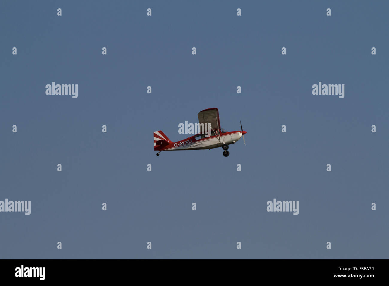 Single engined light aircraft climbing after take off from ...
