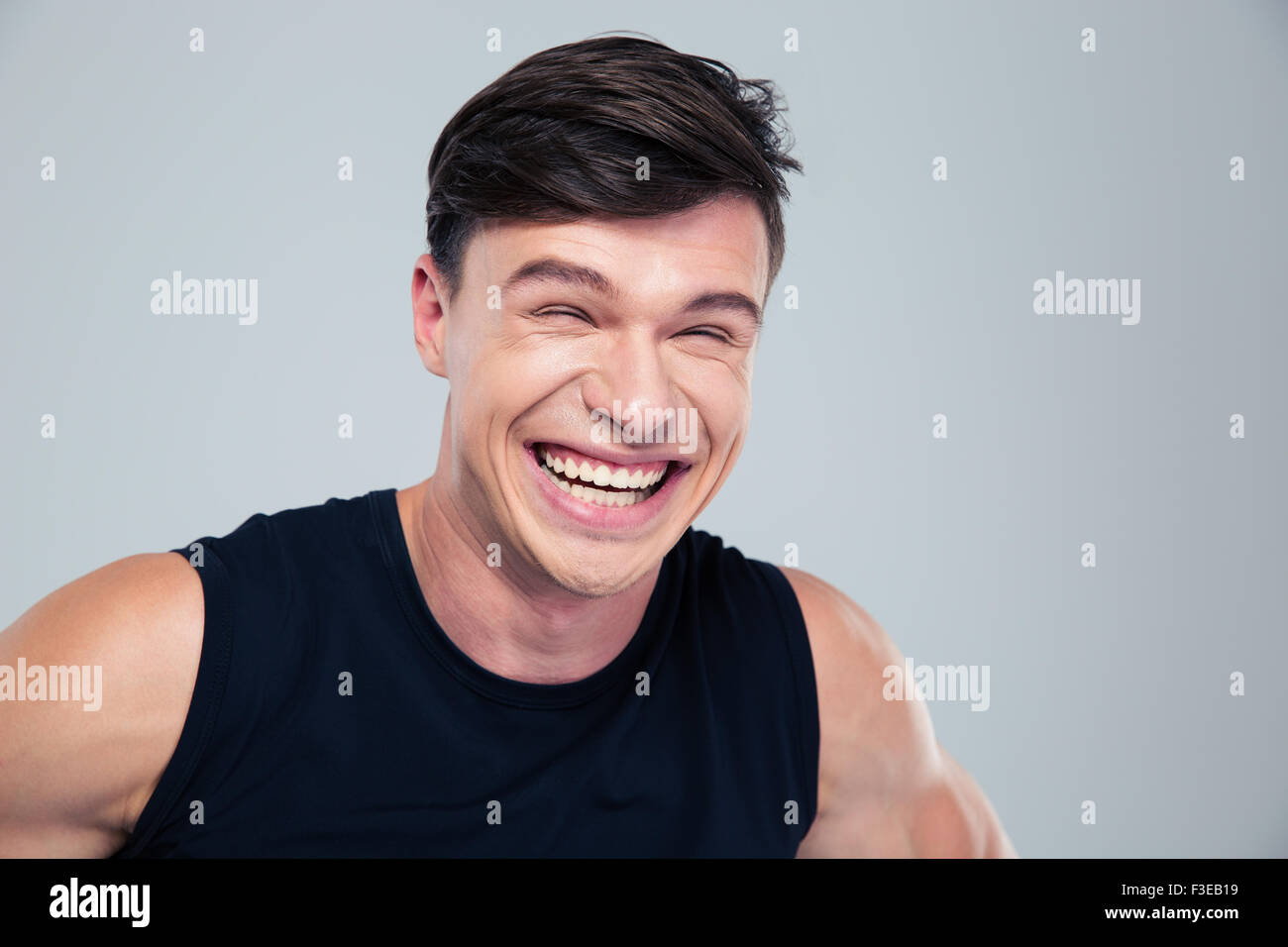Portrait of a funny man laughing isolated on a white background Stock ...