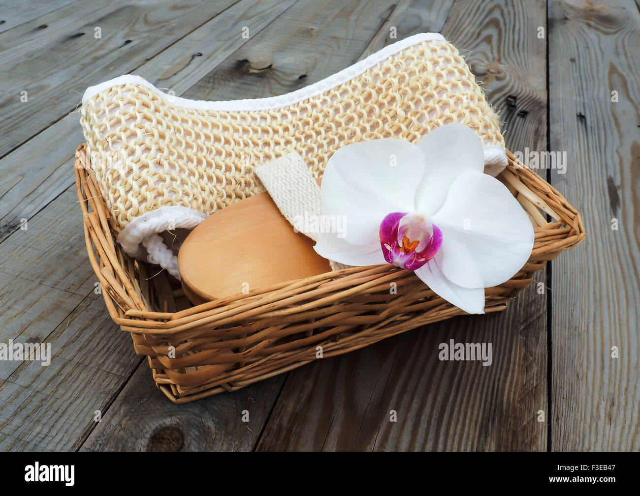Spa set, sponge and orchid Stock Photo - Alamy