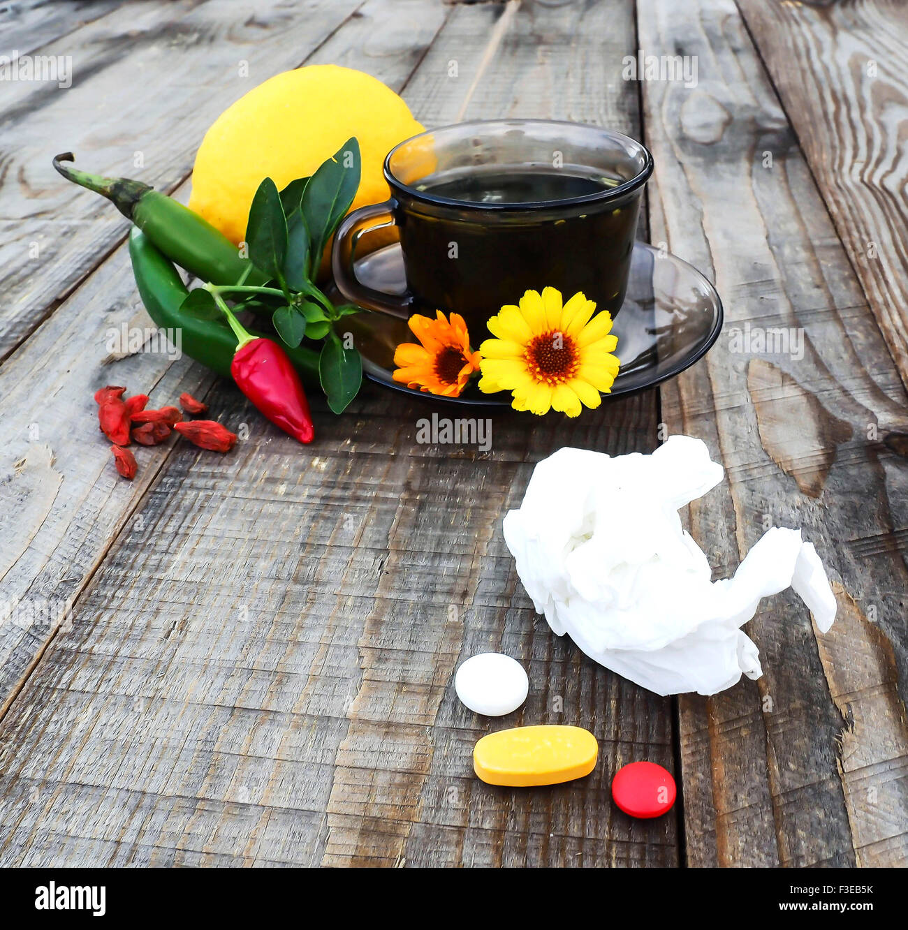 Tea and pills Stock Photo - Alamy