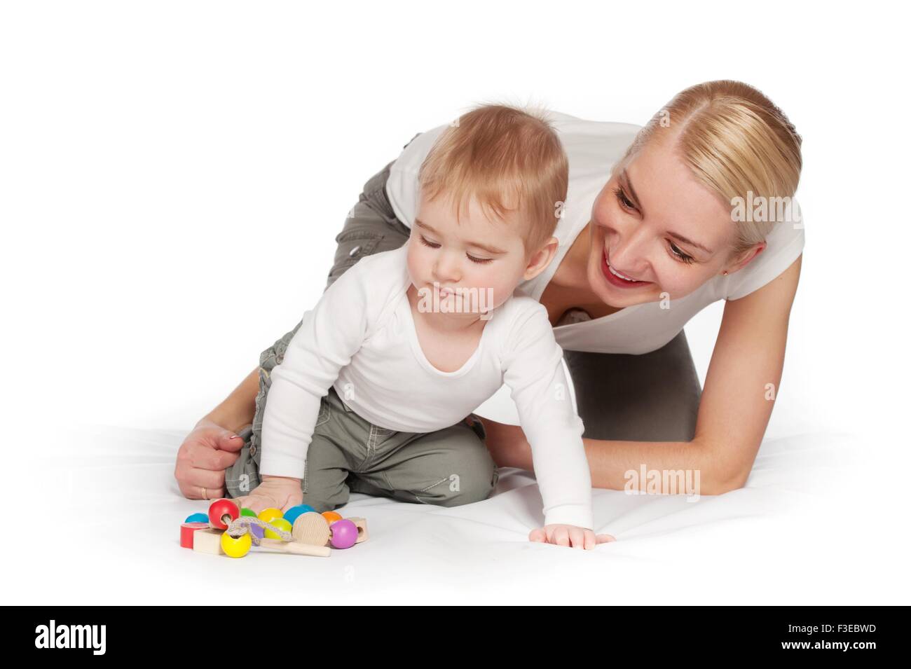 Kid boy mother play Cut Out Stock Images & Pictures - Alamy