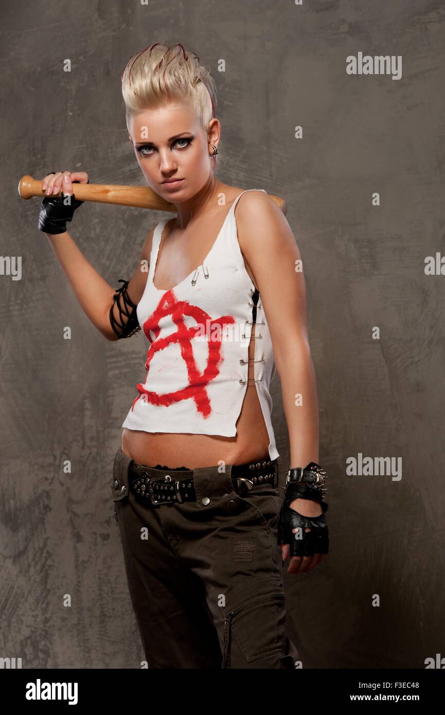 Punk girl with a bat Stock Photo - Alamy