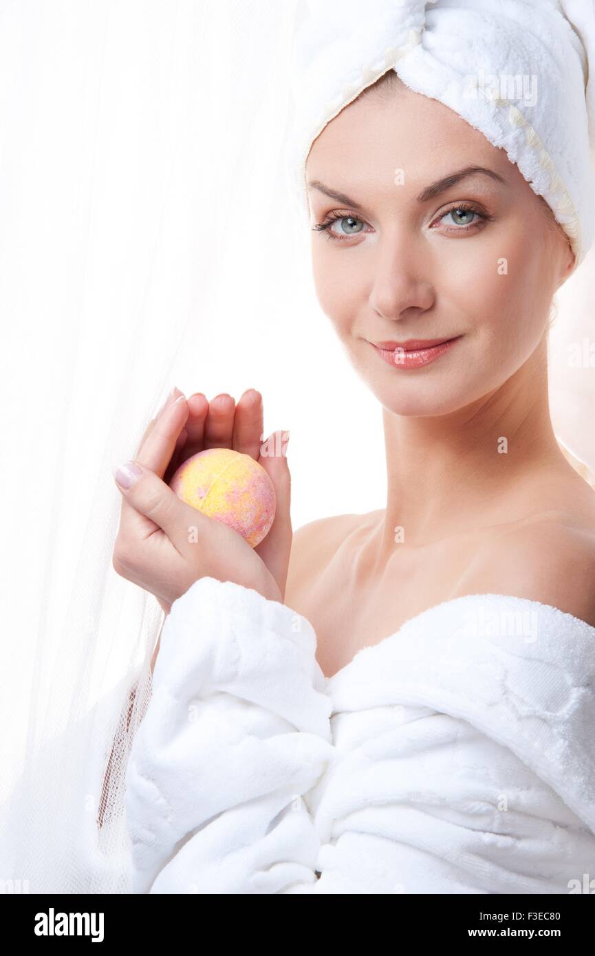 Beautiful woman after shower holding a soap Stock Photo - Alamy