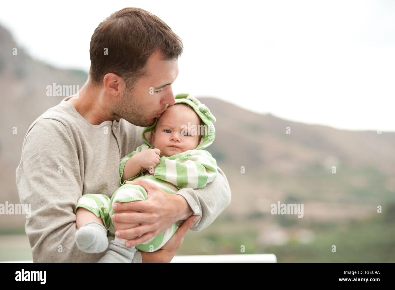 Happy father with his child outdoors Stock Photo - Alamy