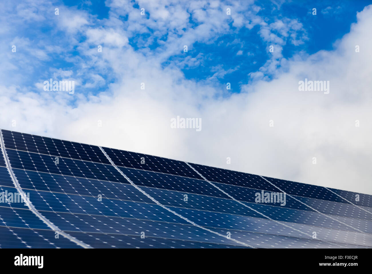 Photovoltaic modules of solar panels with sky on background Stock Photo ...