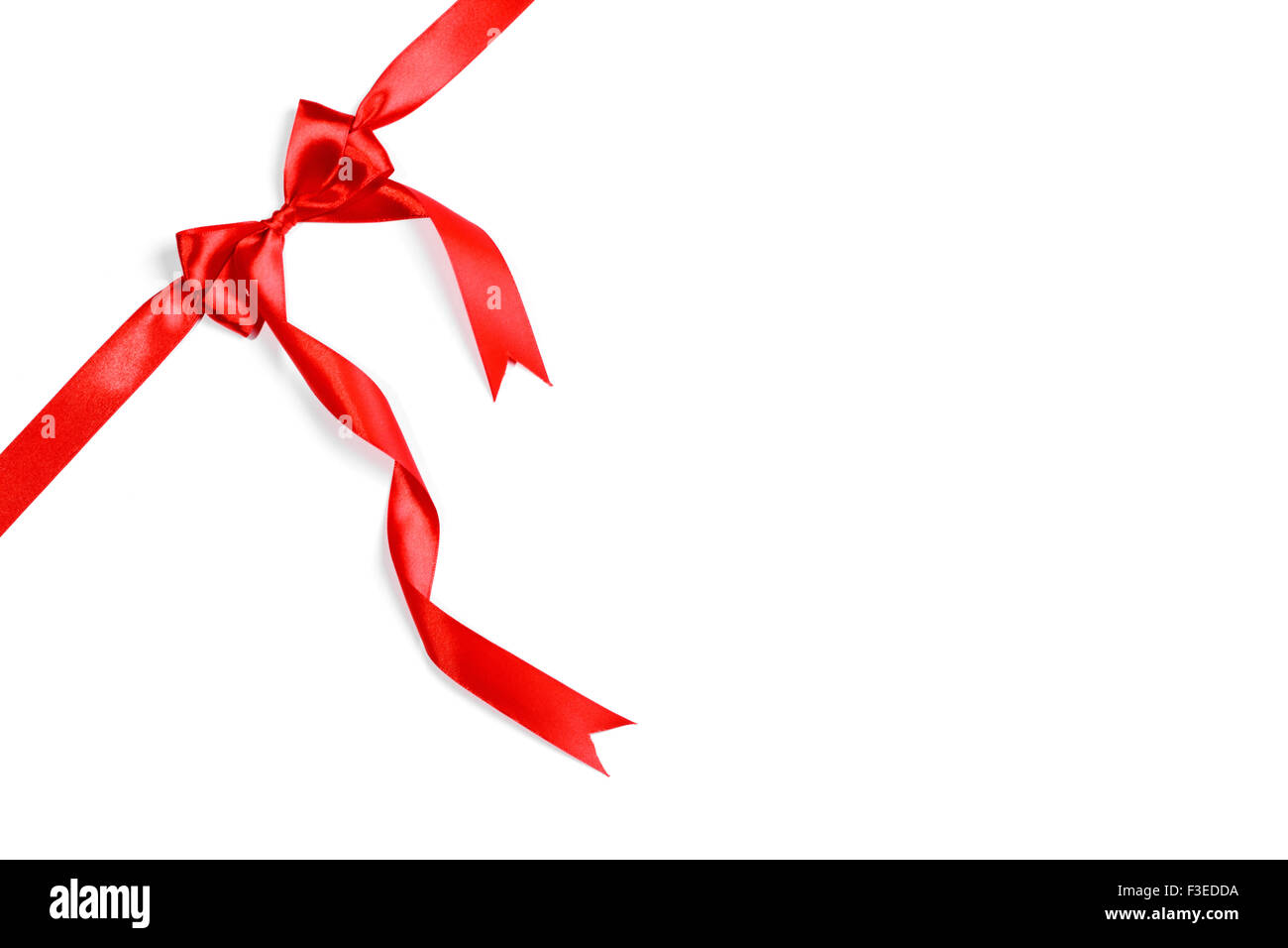 Red ribbons with bow Stock Photo - Alamy
