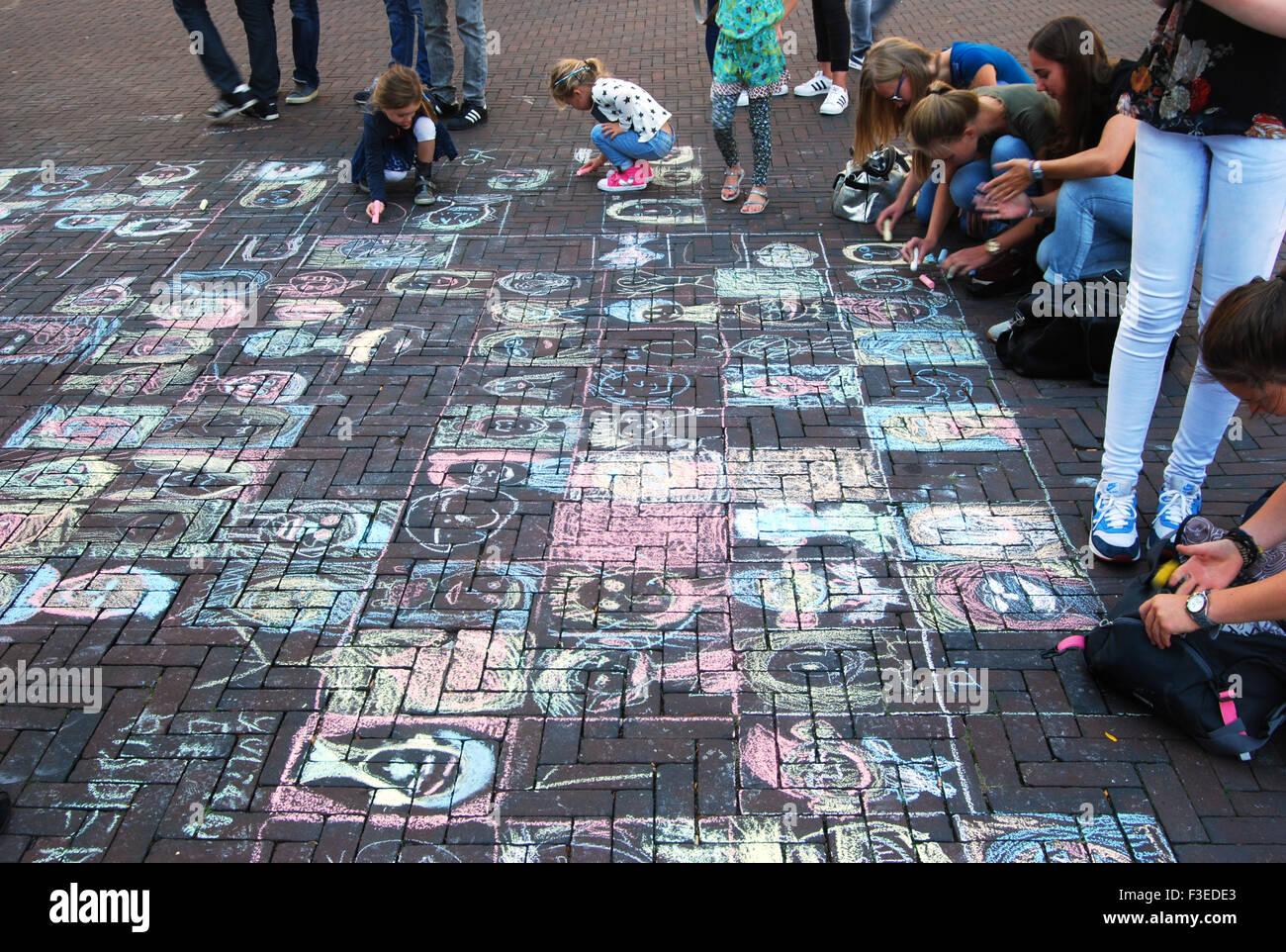 Girl with chalk drawings hi-res stock photography and images - Alamy