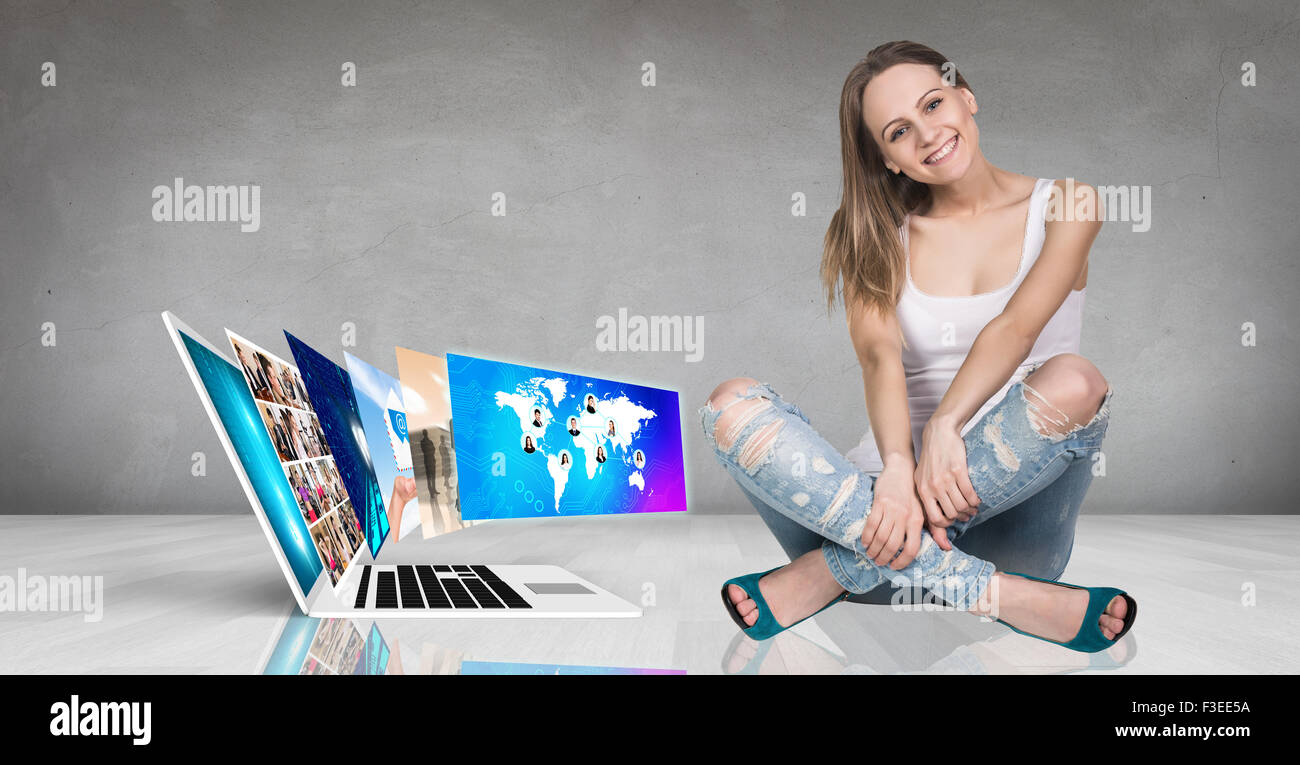 Laptop on the floor Stock Photo - Alamy