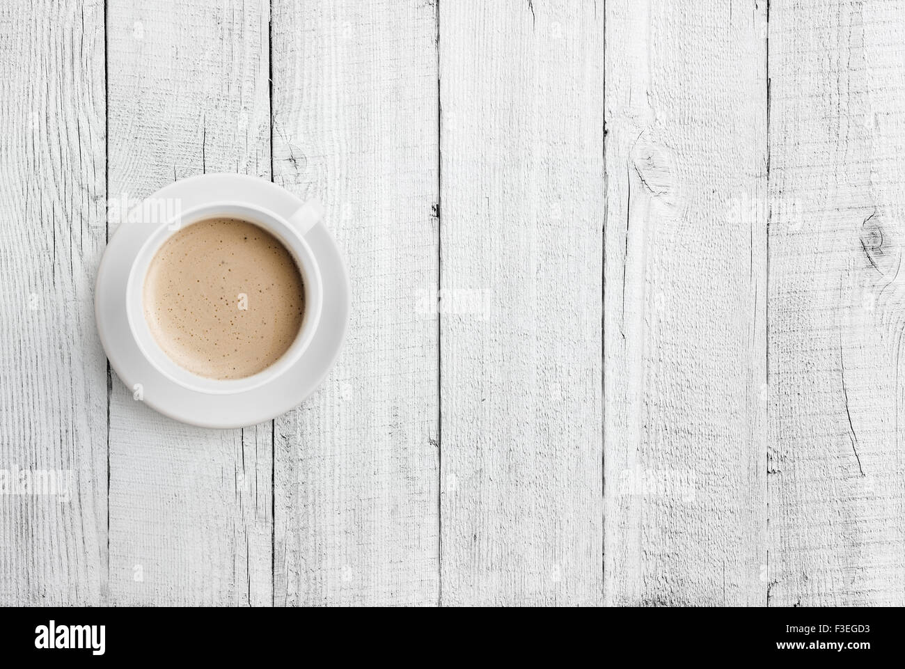 coffee cup on white wood table top view Stock Photo - Alamy