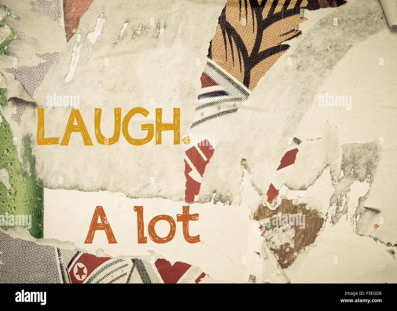 Laugh. A lot - Inspirational message written on vintage grunge ...