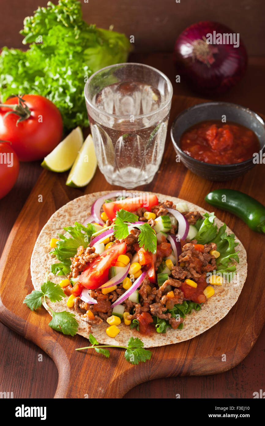 mexican taco with beef tomato salsa onion corn Stock Photo - Alamy