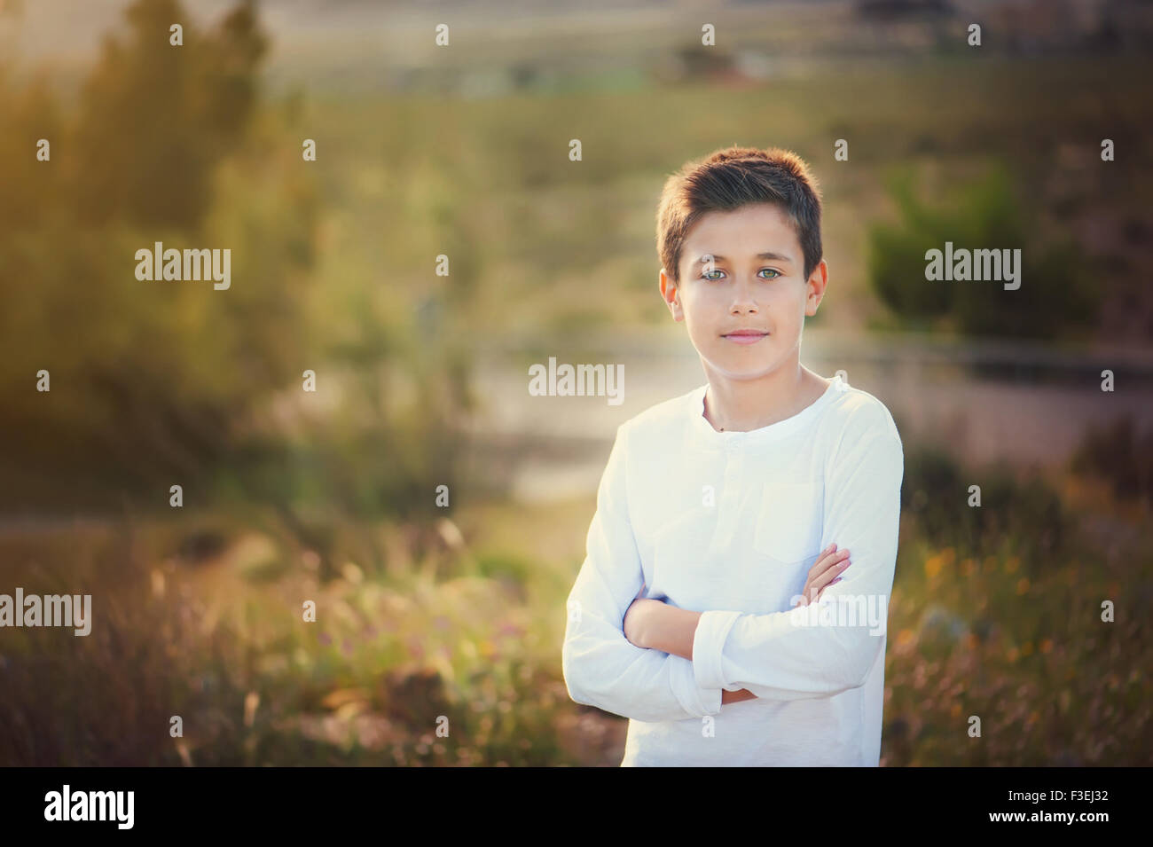 Portrait of a cute boy on the background of nature Stock Photo - Alamy