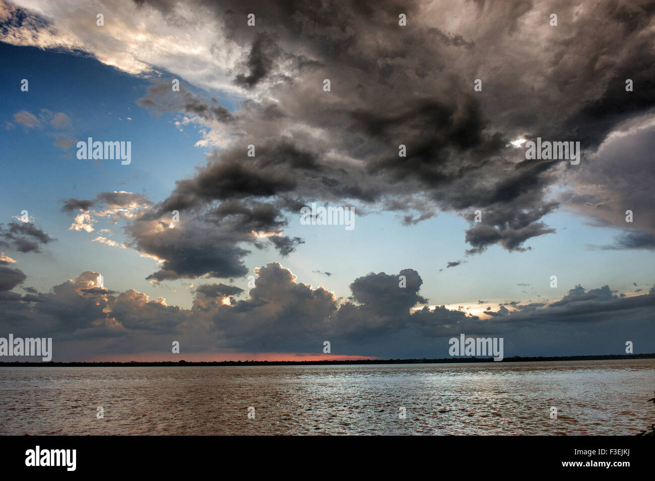 Beautiful and dramatic sky with sundown in the guama river, Belem do ...