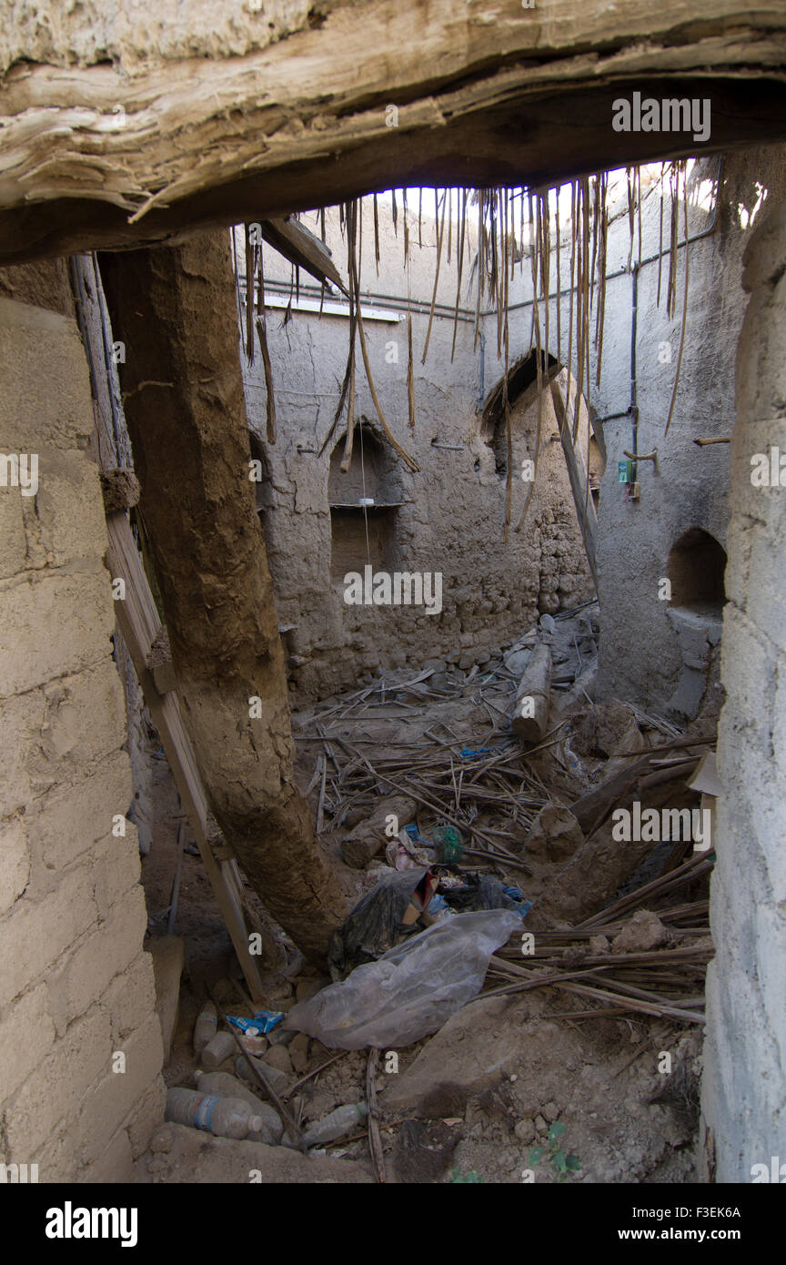 Ornate ancient adobe fortress ruins in a town in the Sultanate of Oman ...
