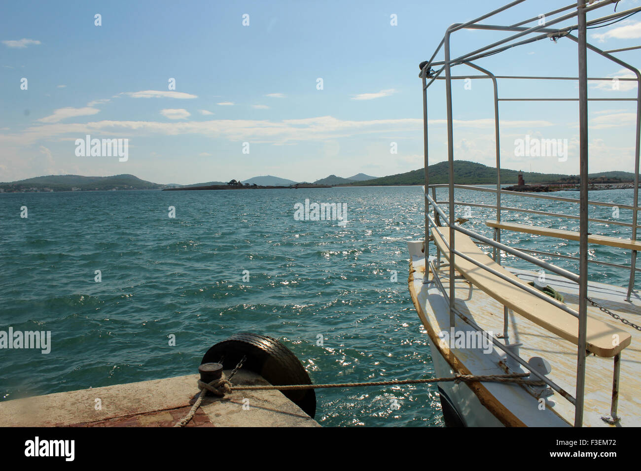 Close up of the front side of ship moored in port. Colorful abstract ...