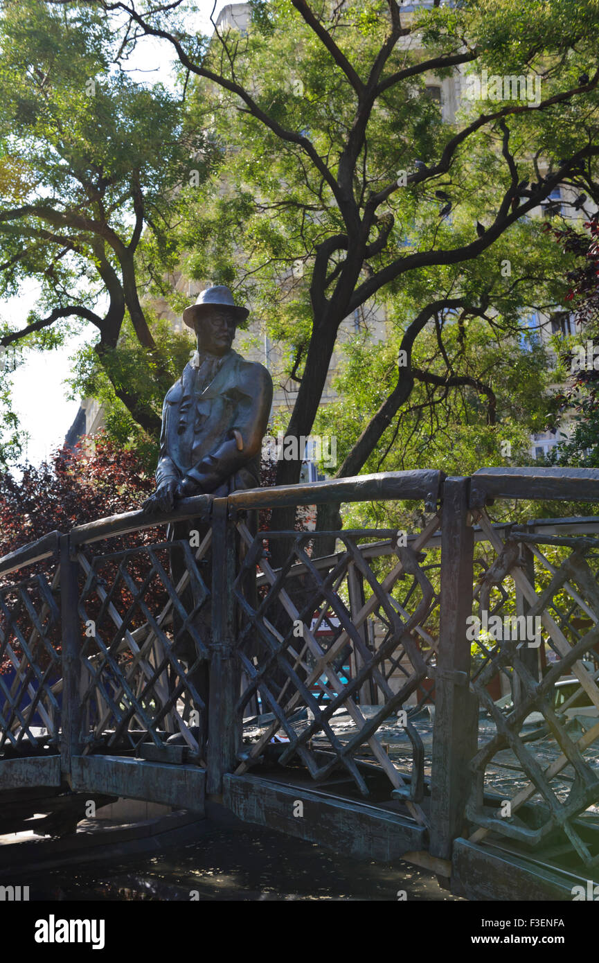 A sculpture of Imre Nagy standing on a bridge in Budapest, Hungary ...