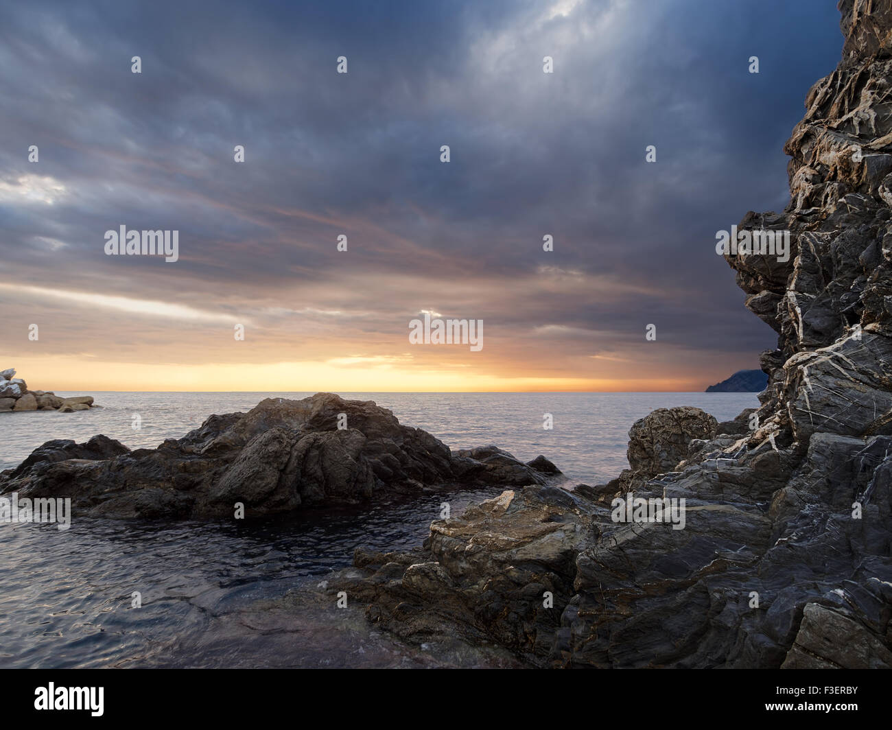 Sunset on the rocks. Manarola,Cinque Terre, Italy Stock Photo - Alamy