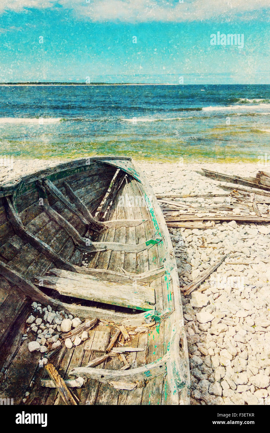 Old wooden boat on the seashore, vintage styled aged photo Stock Photo ...