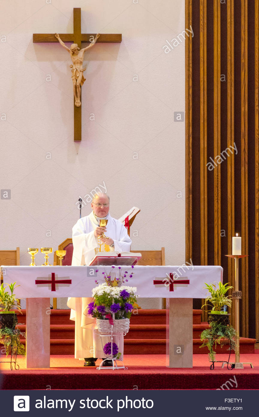 Catholic Priest Mass Blessing Stock Photos & Catholic Priest Mass ...