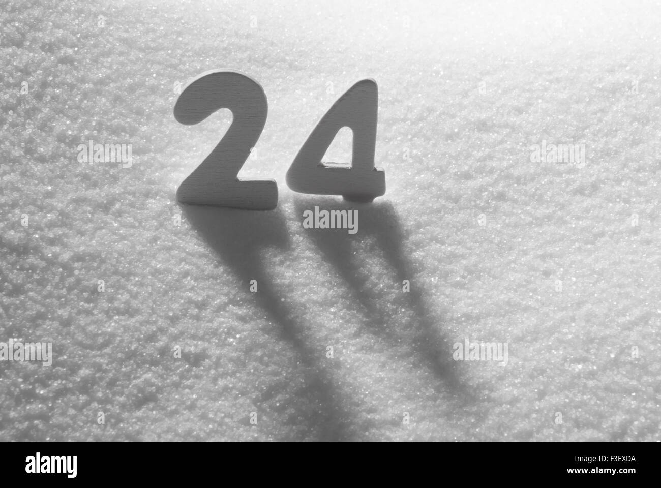 White Number 24 On Snow Stock Photo - Alamy