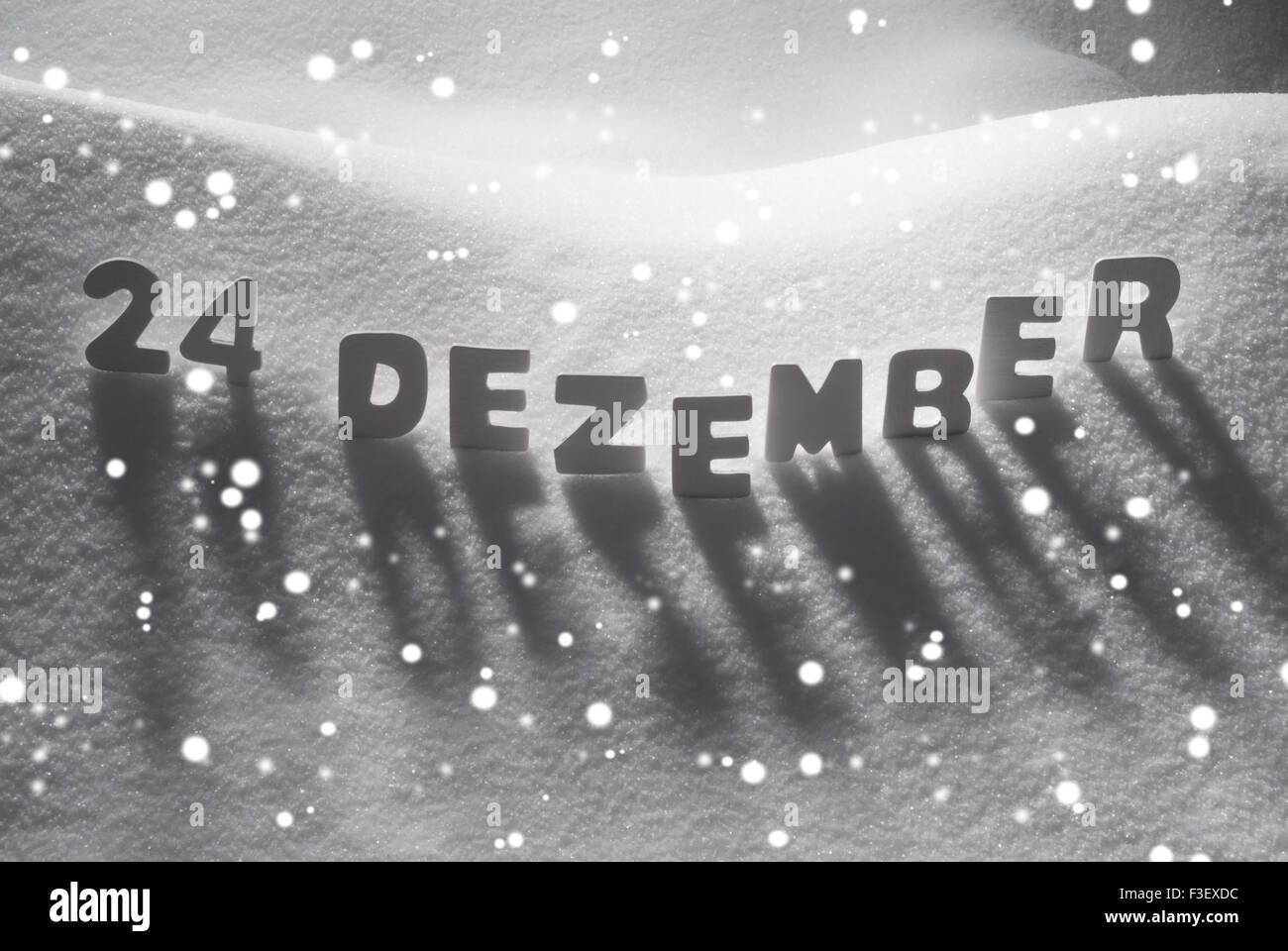 White Word 24 Dezember Means 24th December On Snow, Snowflakes Stock ...