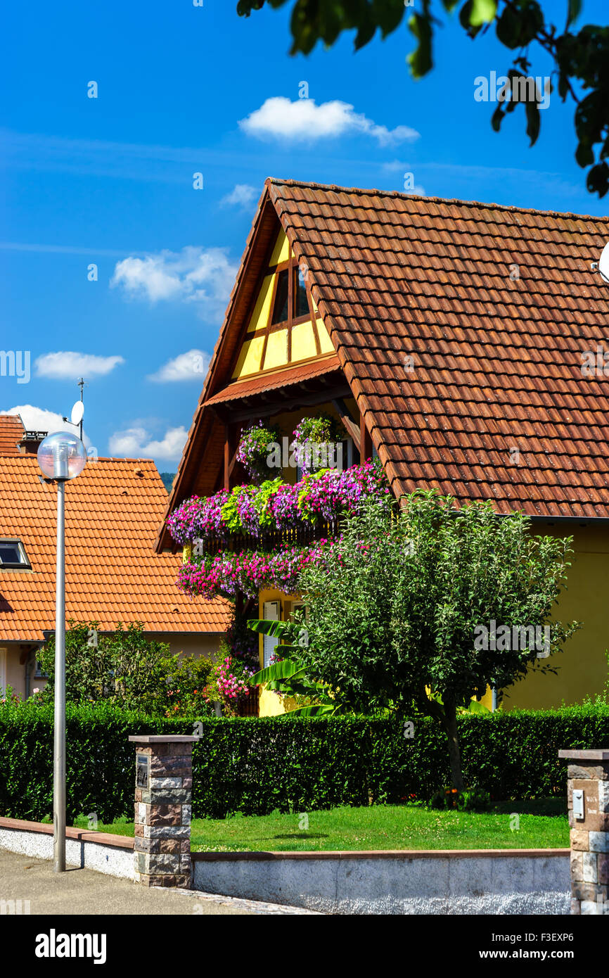 Classic french village house renovated and decorated by flowers, Alsace ...