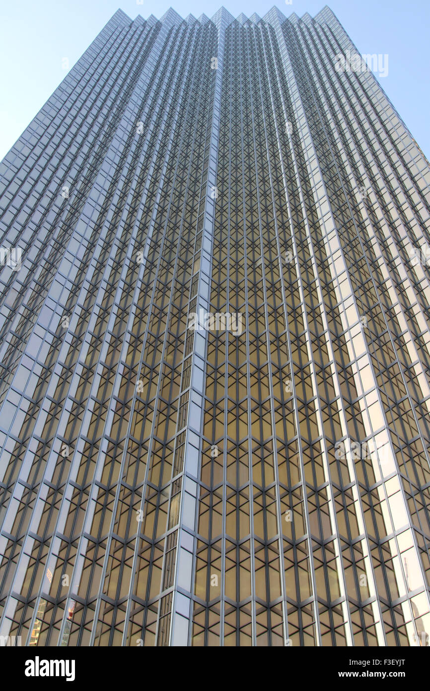 Modern high rise glass building with metal x designs Stock Photo - Alamy