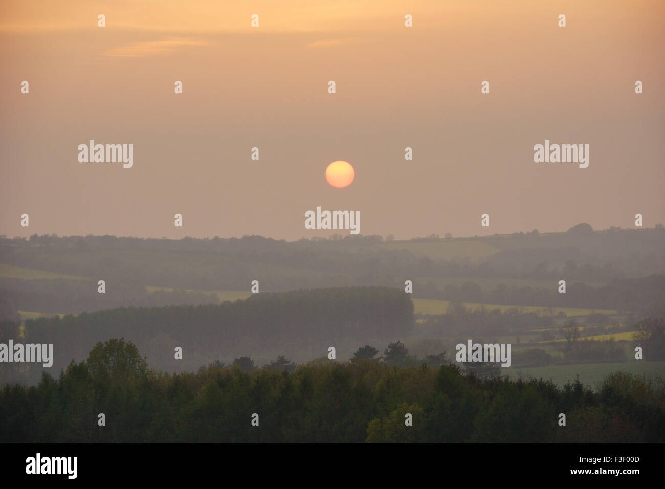 Sunset over Cotswold landscape Stock Photo - Alamy