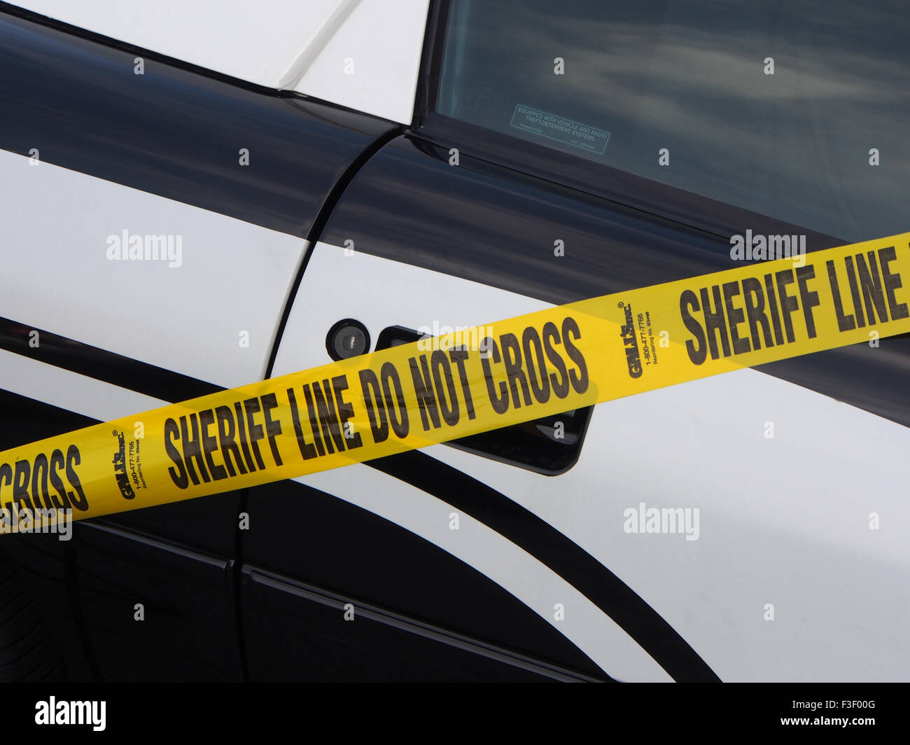 A sheriff line do not cross tape Stock Photo - Alamy