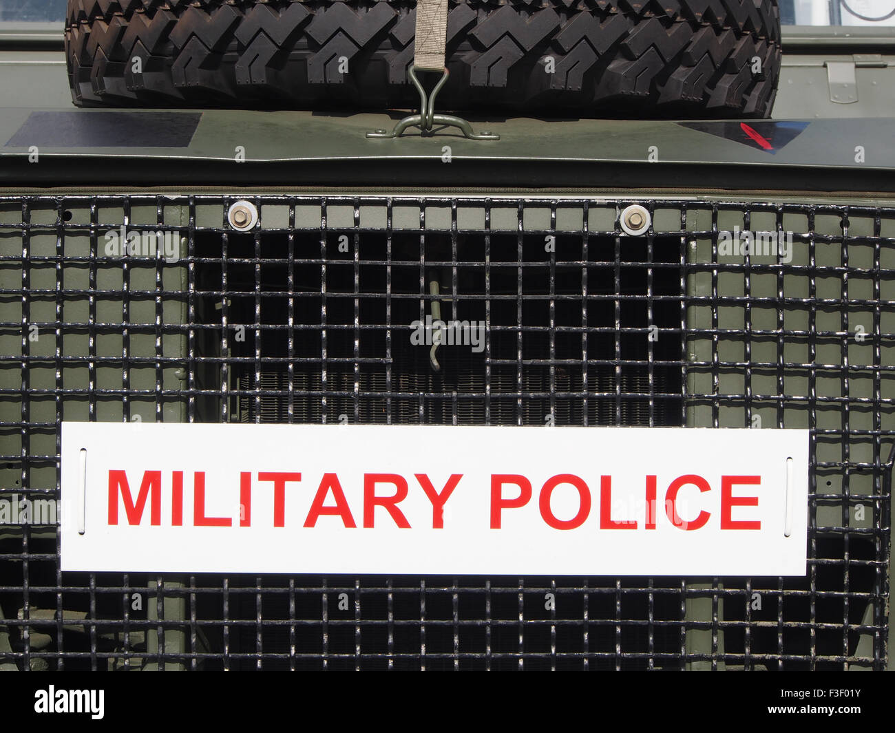 The Grill of a military police land rover with a Military Police sign ...