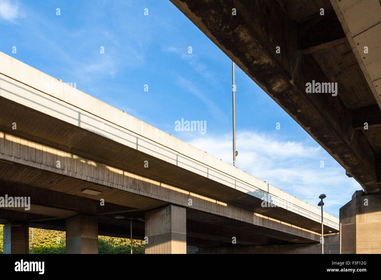 Underneath a concrete bridge. Two of the road bridges that form part of ...