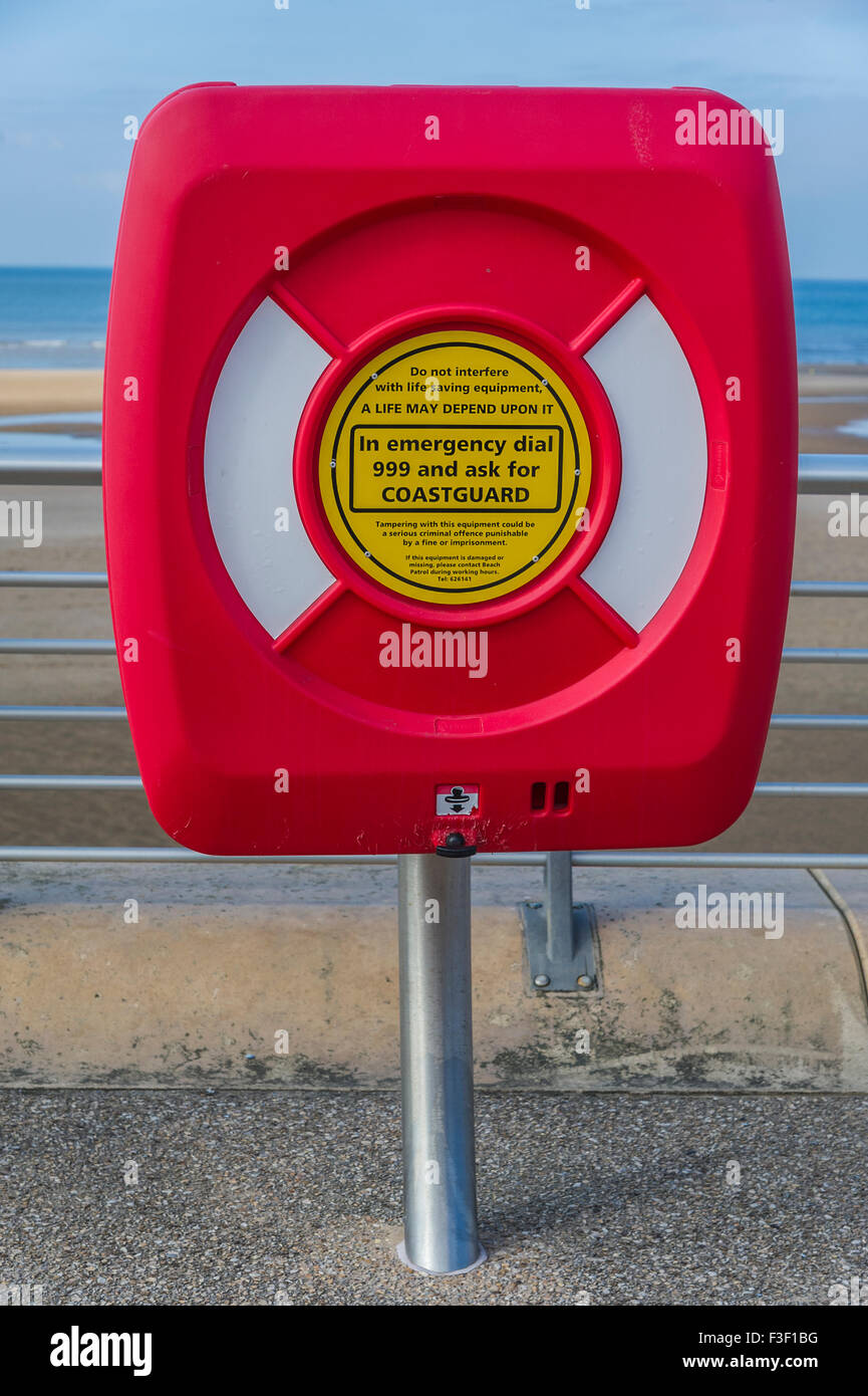 Seaside promenade safety floatation ring cabinet Stock Photo - Alamy